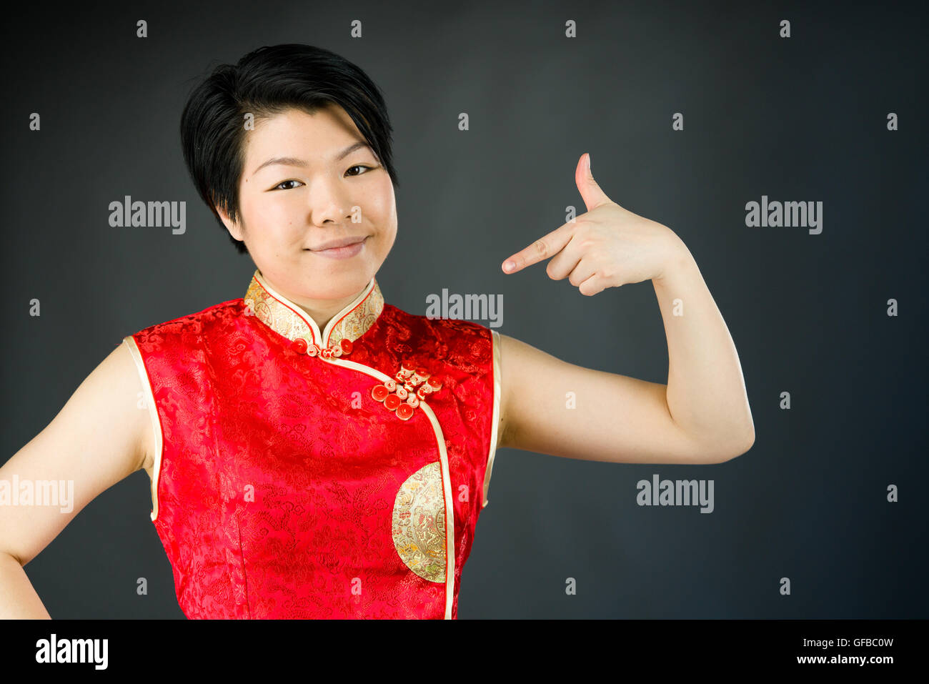 female model attractive woman on plain background with copy space proud ...
