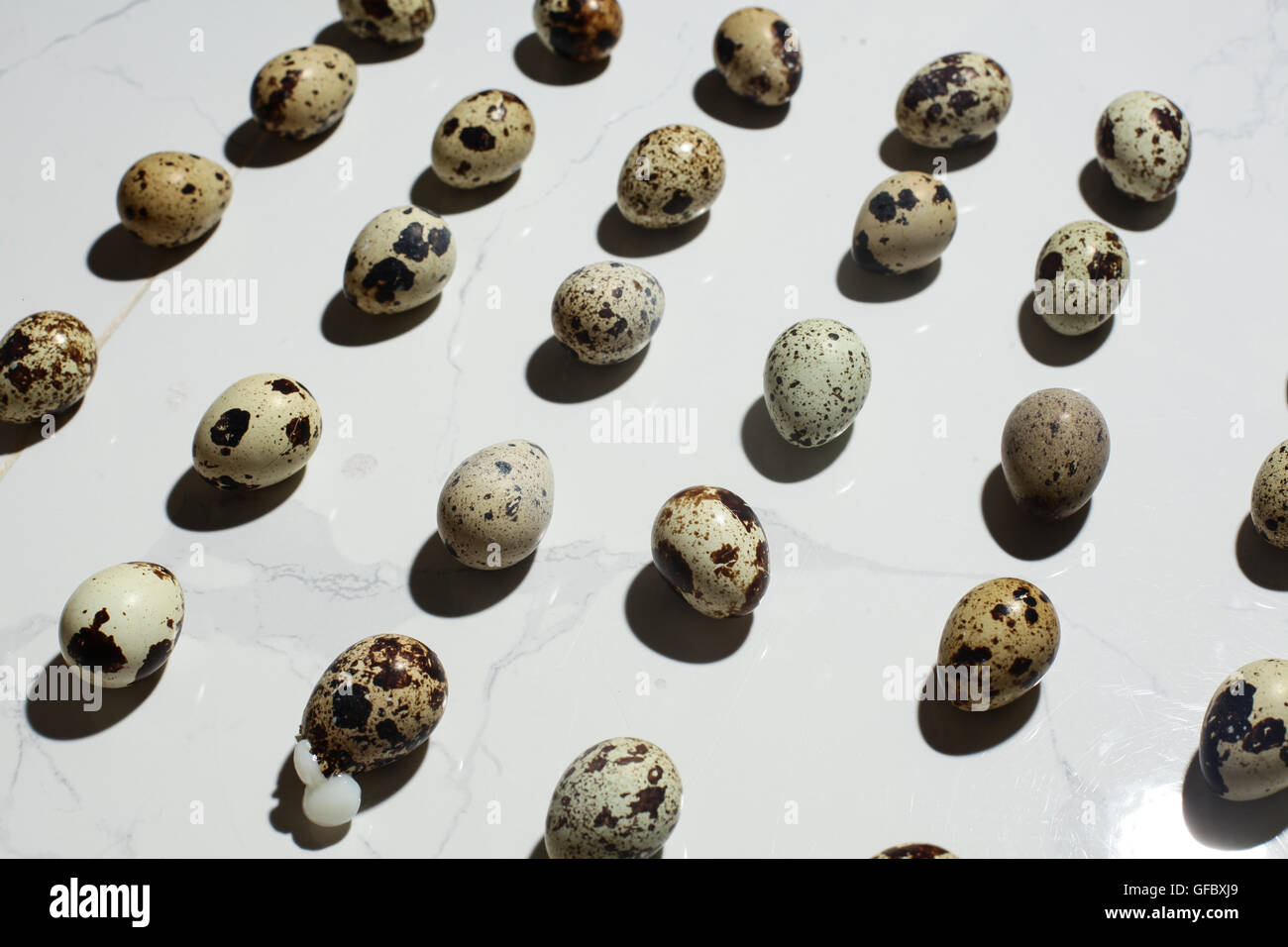Group of quail eggs on the white background Stock Photo - Alamy