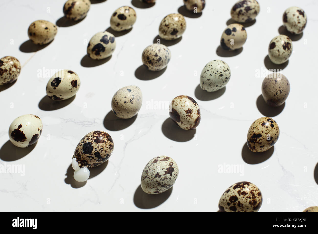 Group of quail eggs on the white background Stock Photo - Alamy