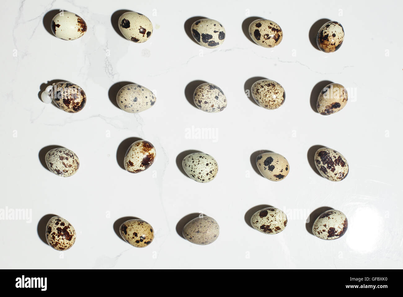 Group of quail eggs on the white background Stock Photo - Alamy