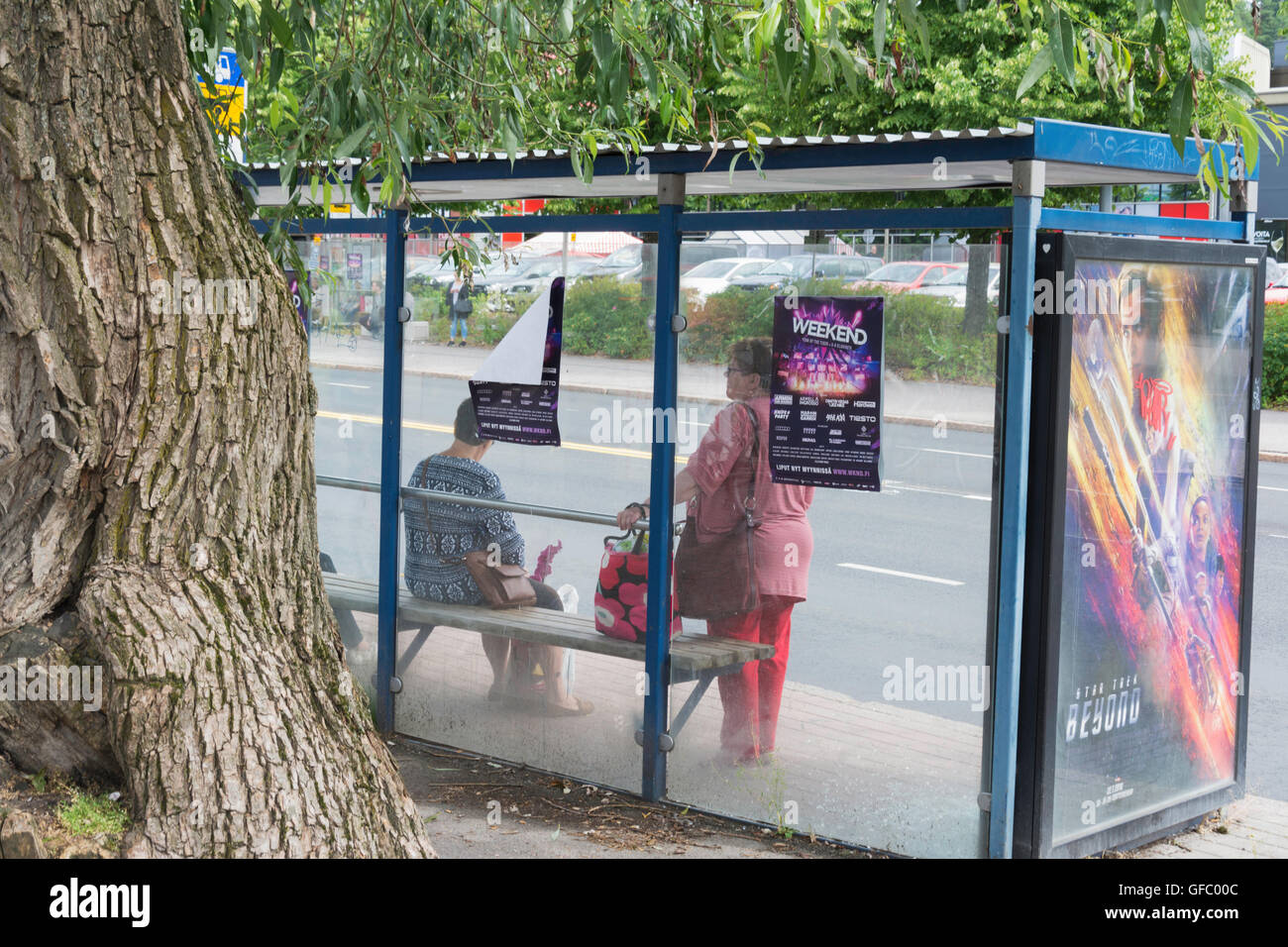 Busstop woman hi-res stock photography and images - Alamy