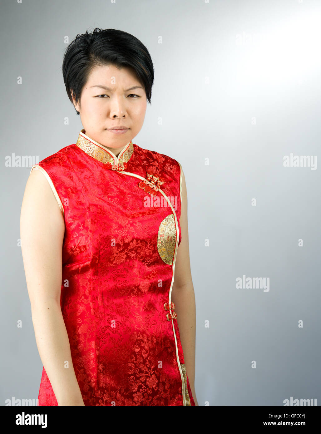 female model attractive woman on plain background with copy space upset ...