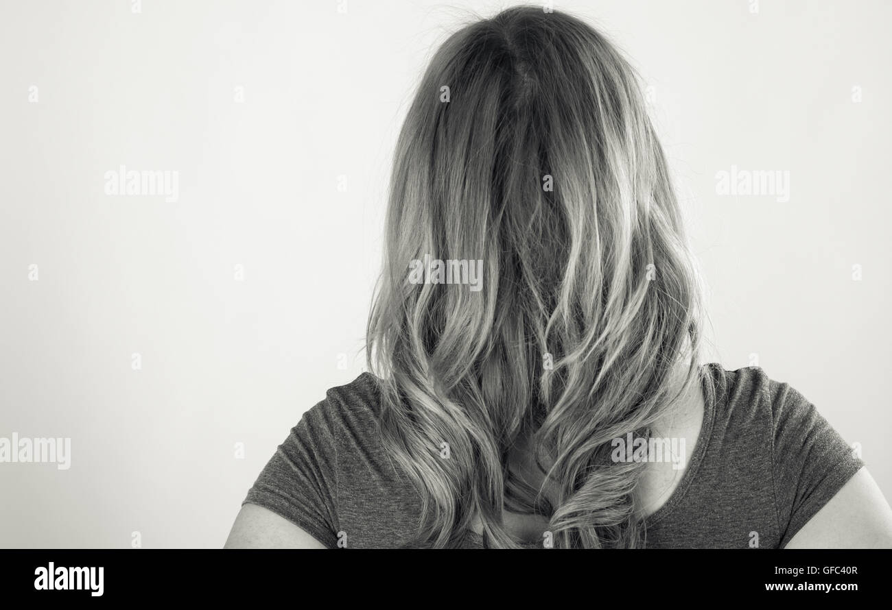 female model attractive woman on plein background with copy space rear ...