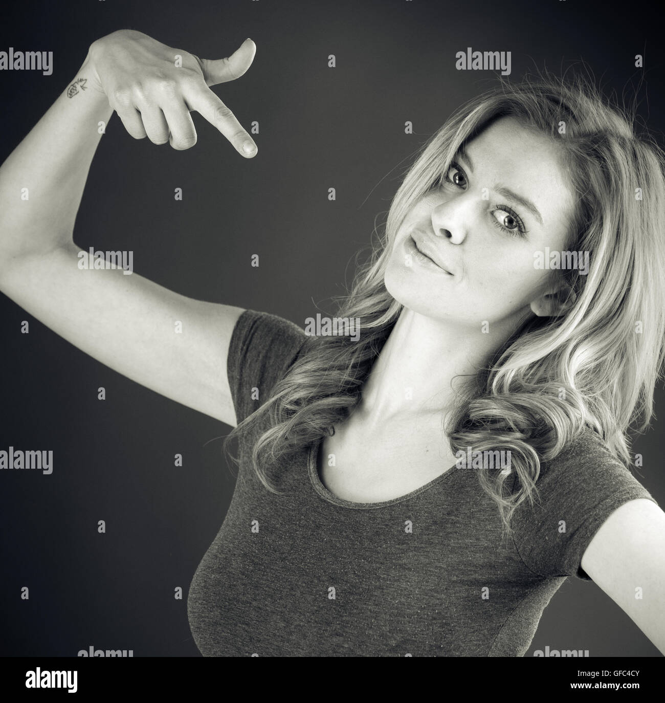 female model attractive woman on plein background with copy space proud ...