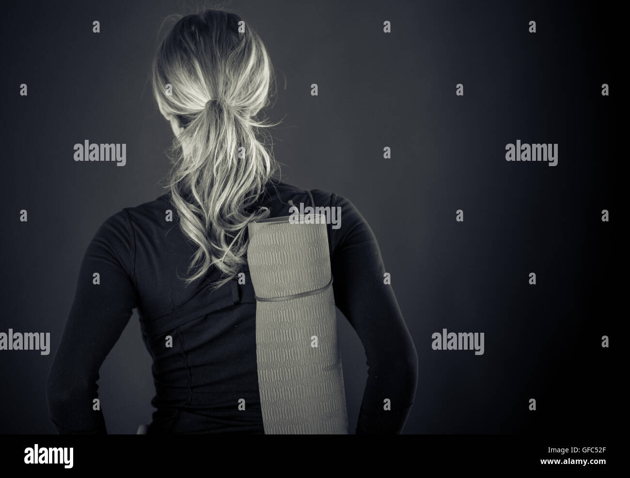 female model attractive woman on plein background with copy space rear ...