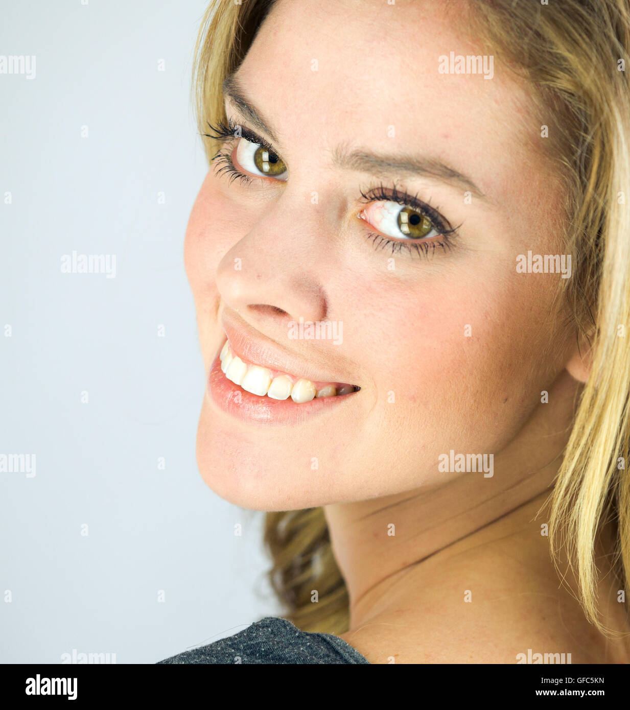 Woman smiling and turning around hi-res stock photography and images ...