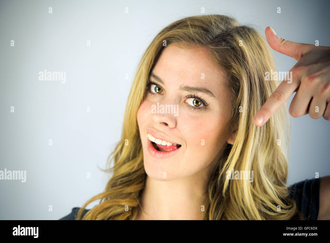 female model attractive woman on plein background with copy space proud ...