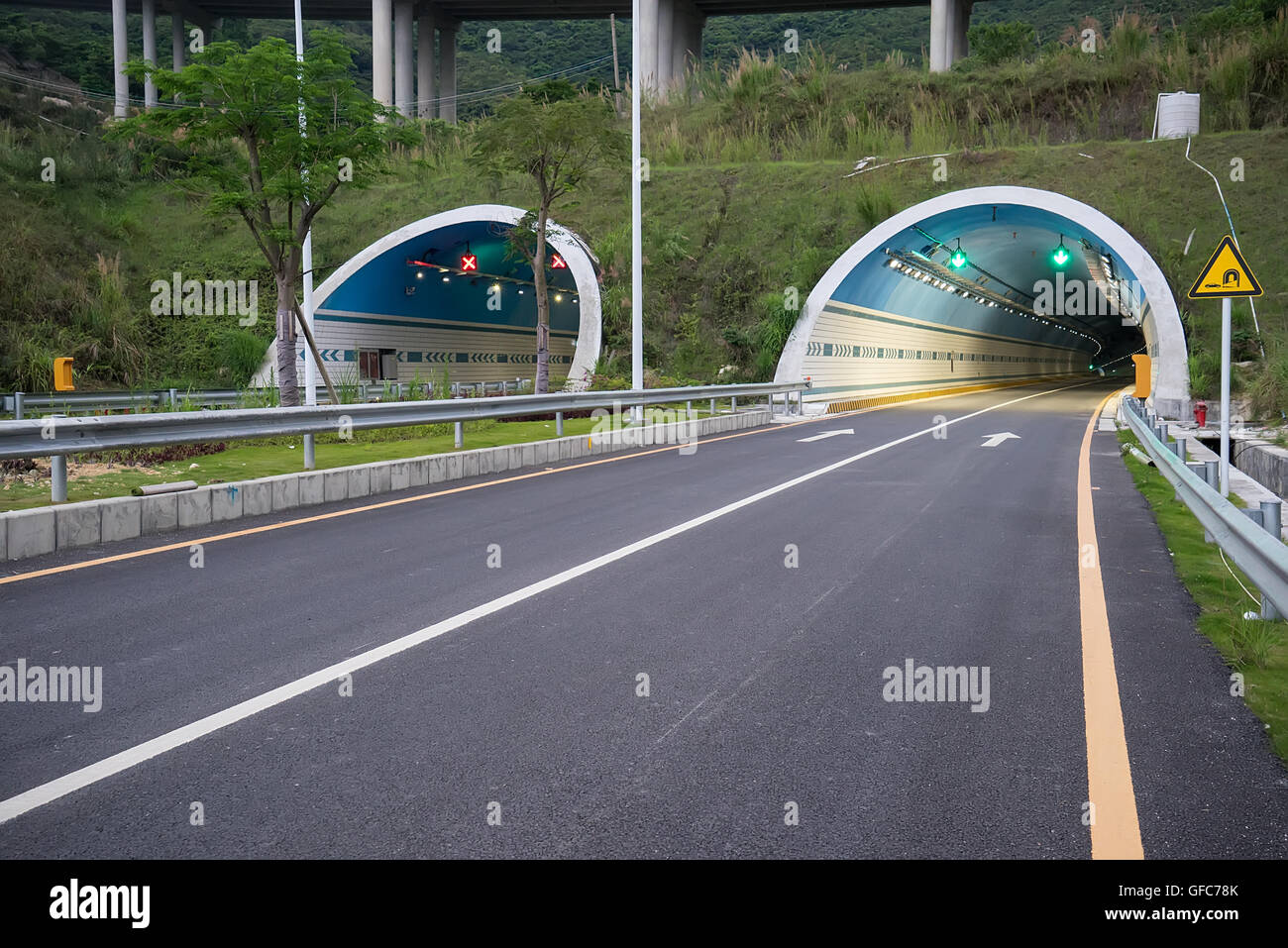 Car driving on to tunnel Stock Photo - Alamy