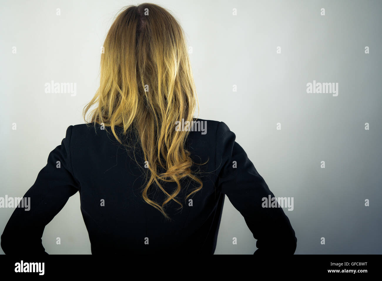 female model attractive woman on plein background with copy space rear ...