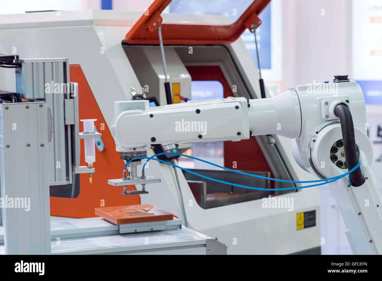 robotic hand machine tool at industrial manufacture factory Stock Photo ...