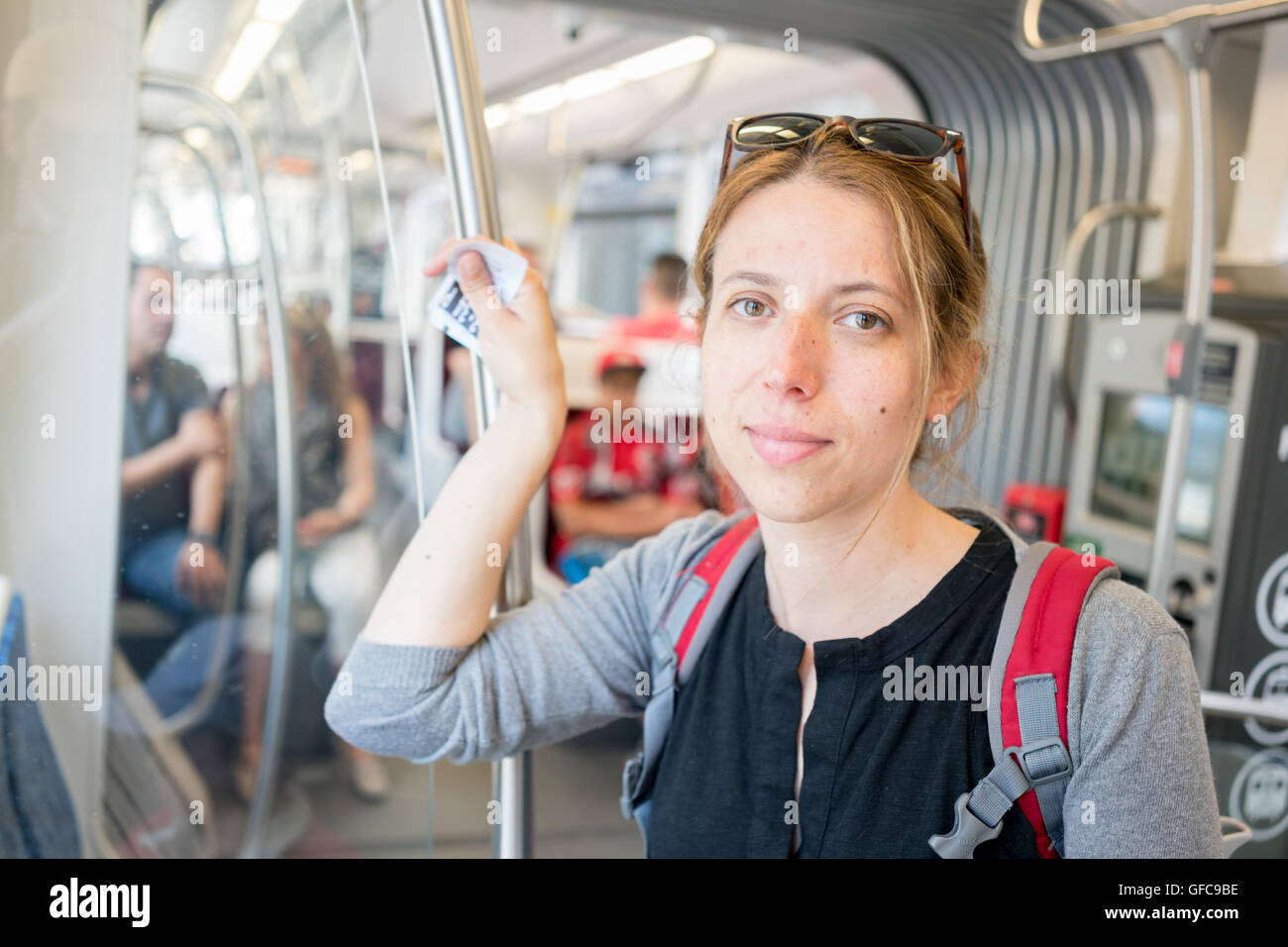 woman in public transit Stock Photo - Alamy