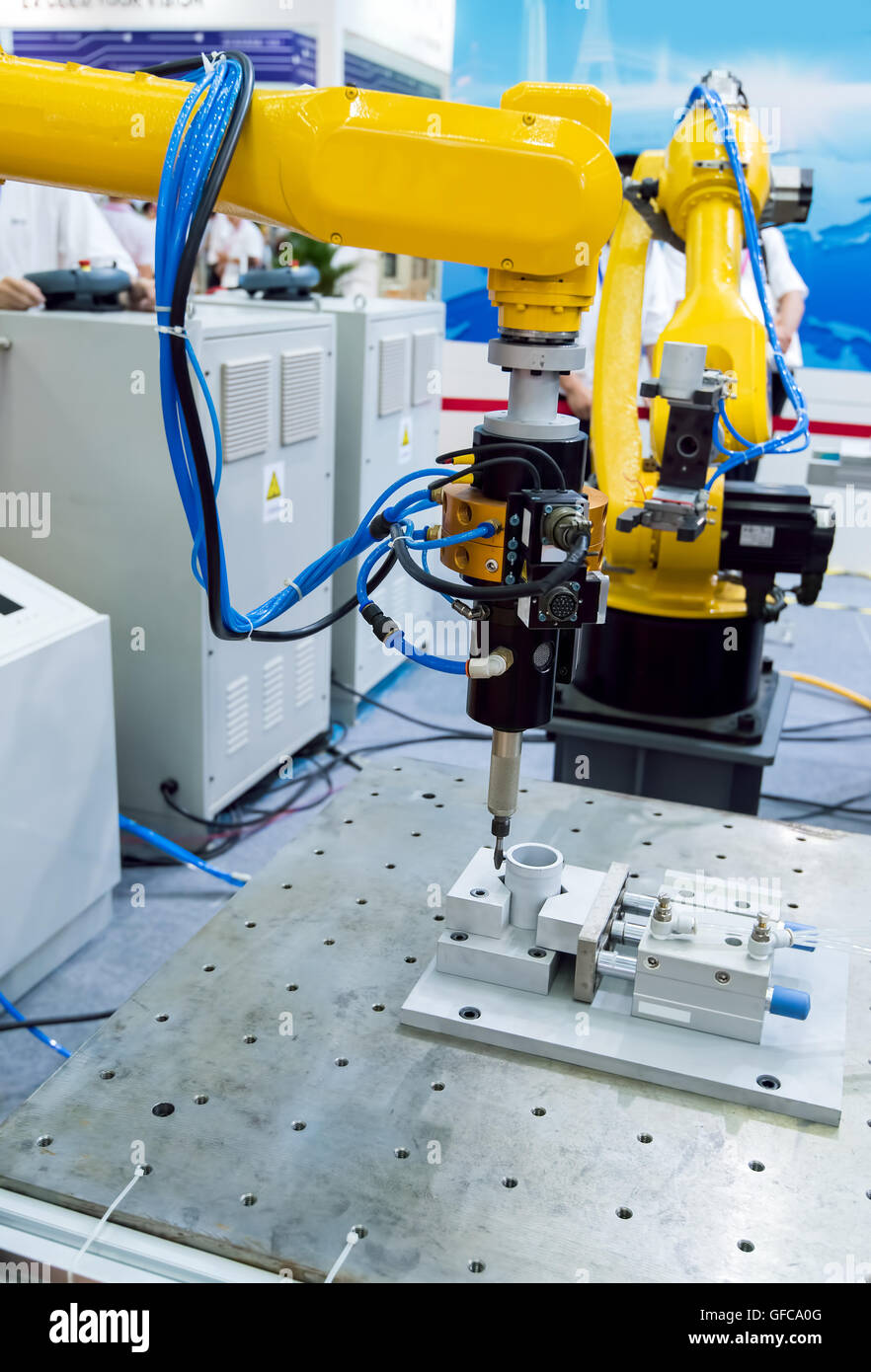 robotic hand machine tool at industrial manufacture factory Stock Photo ...