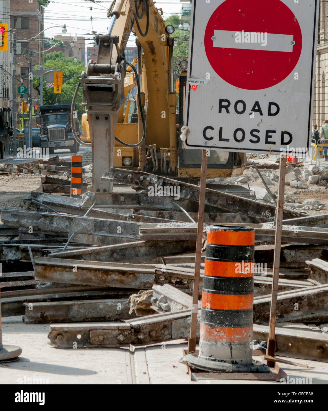 Sign board with a mechanical digger at a construction site 2009-08-10 ...