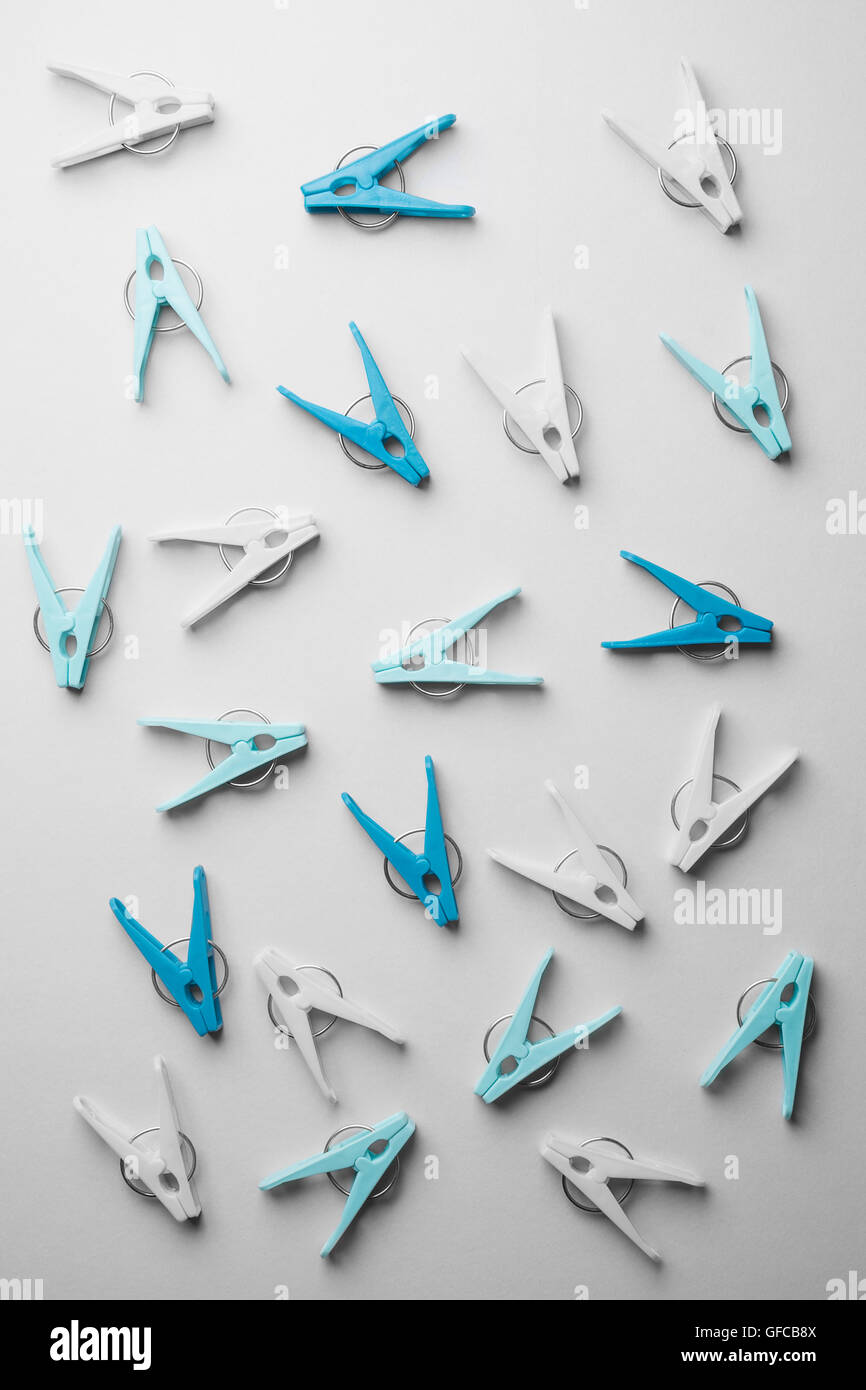 Laundry clips disorganized on a white background, top view Stock Photo ...