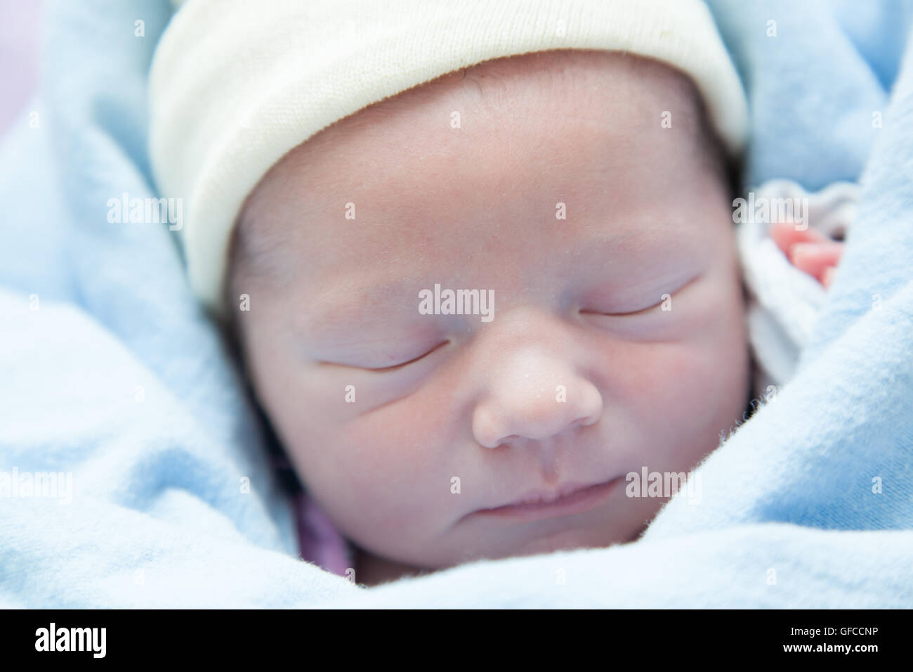 Close-up of a newborn baby sleeping Stock Photo - Alamy