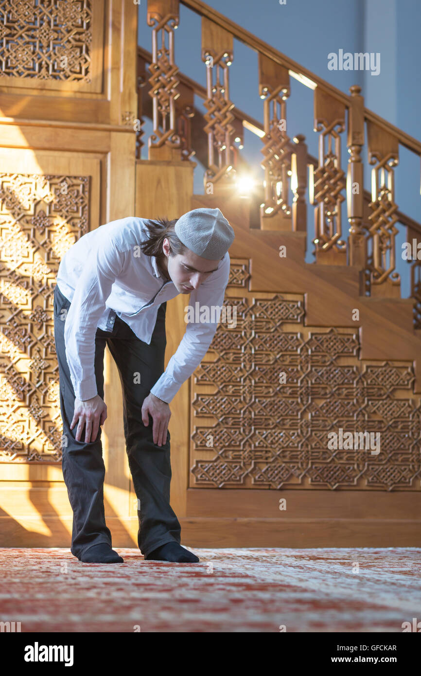 Religious muslim man praying, steps of praying Stock Photo - Alamy