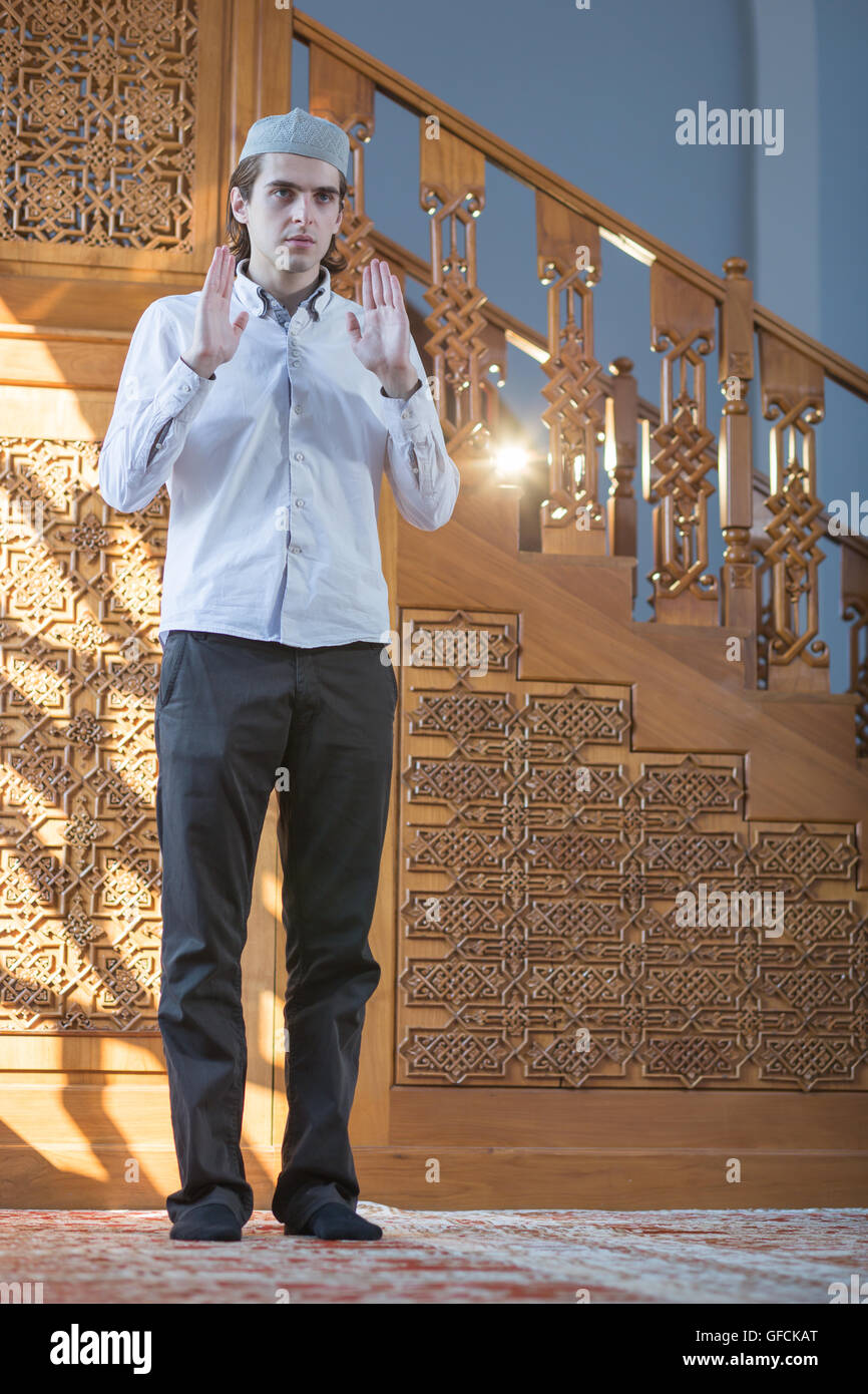 Religious muslim man praying, steps of praying Stock Photo - Alamy