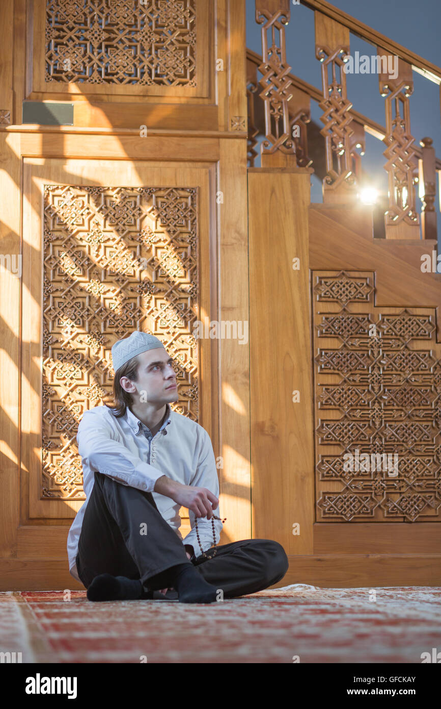 Religious muslim man praying, steps of praying Stock Photo - Alamy