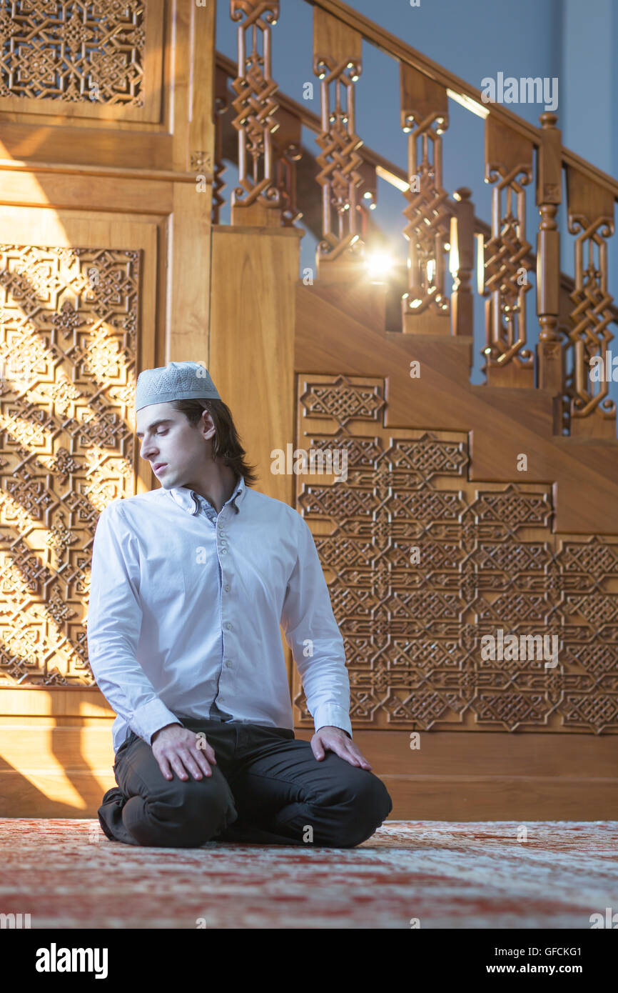 Religious muslim man praying, steps of praying Stock Photo - Alamy