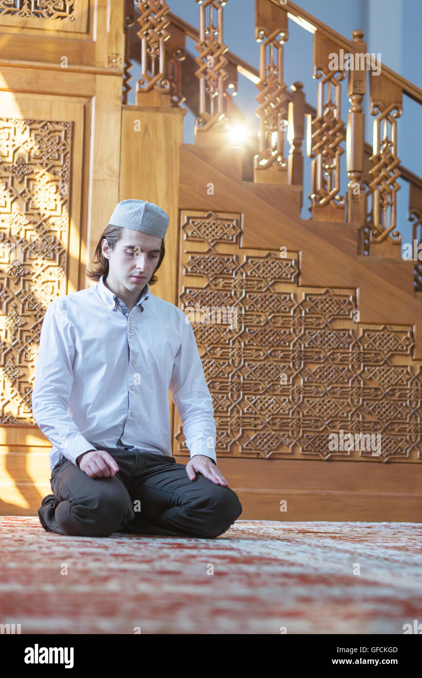 Religious muslim man praying, steps of praying Stock Photo - Alamy