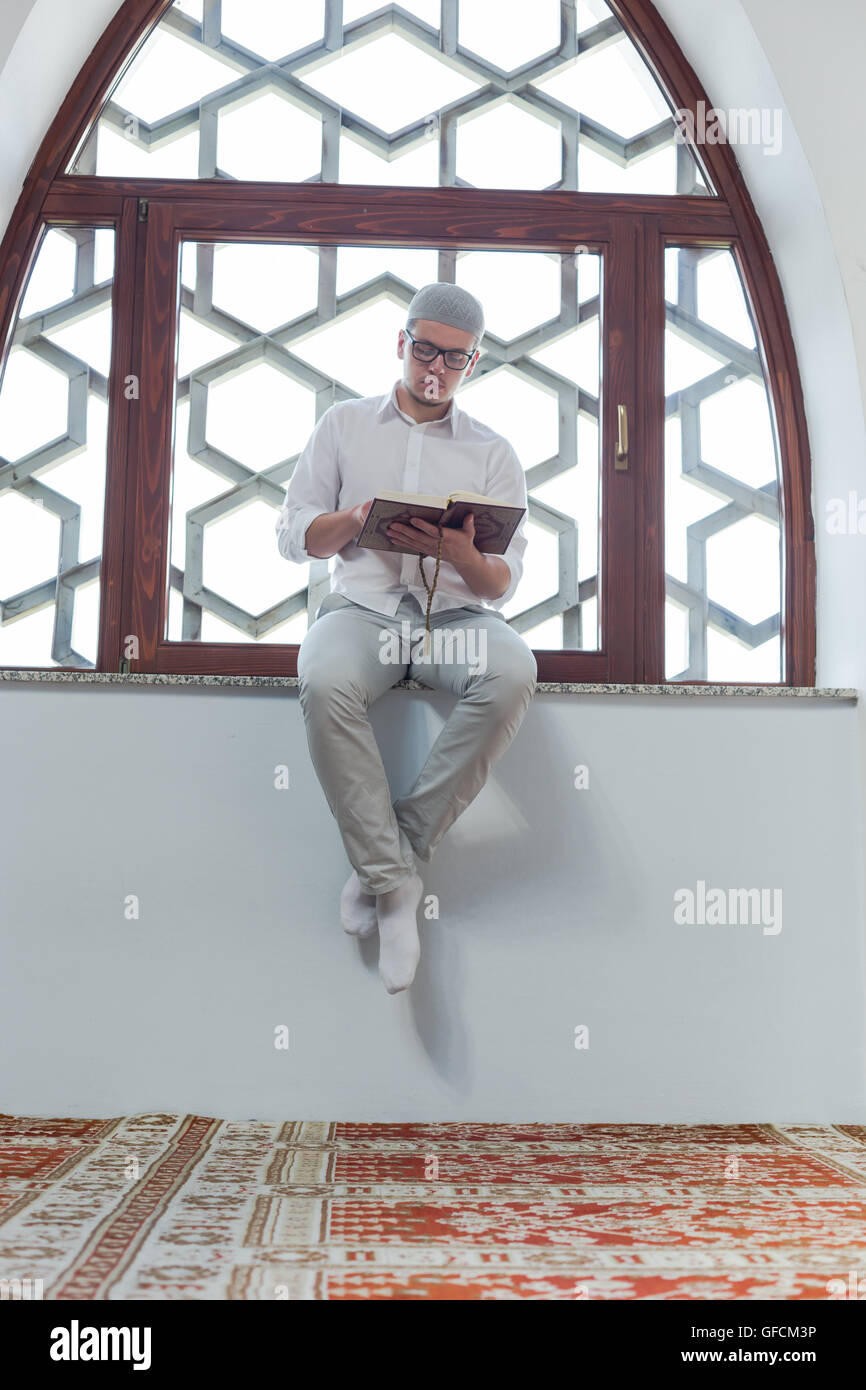 Religious muslim man praying inside the mosque Stock Photo - Alamy