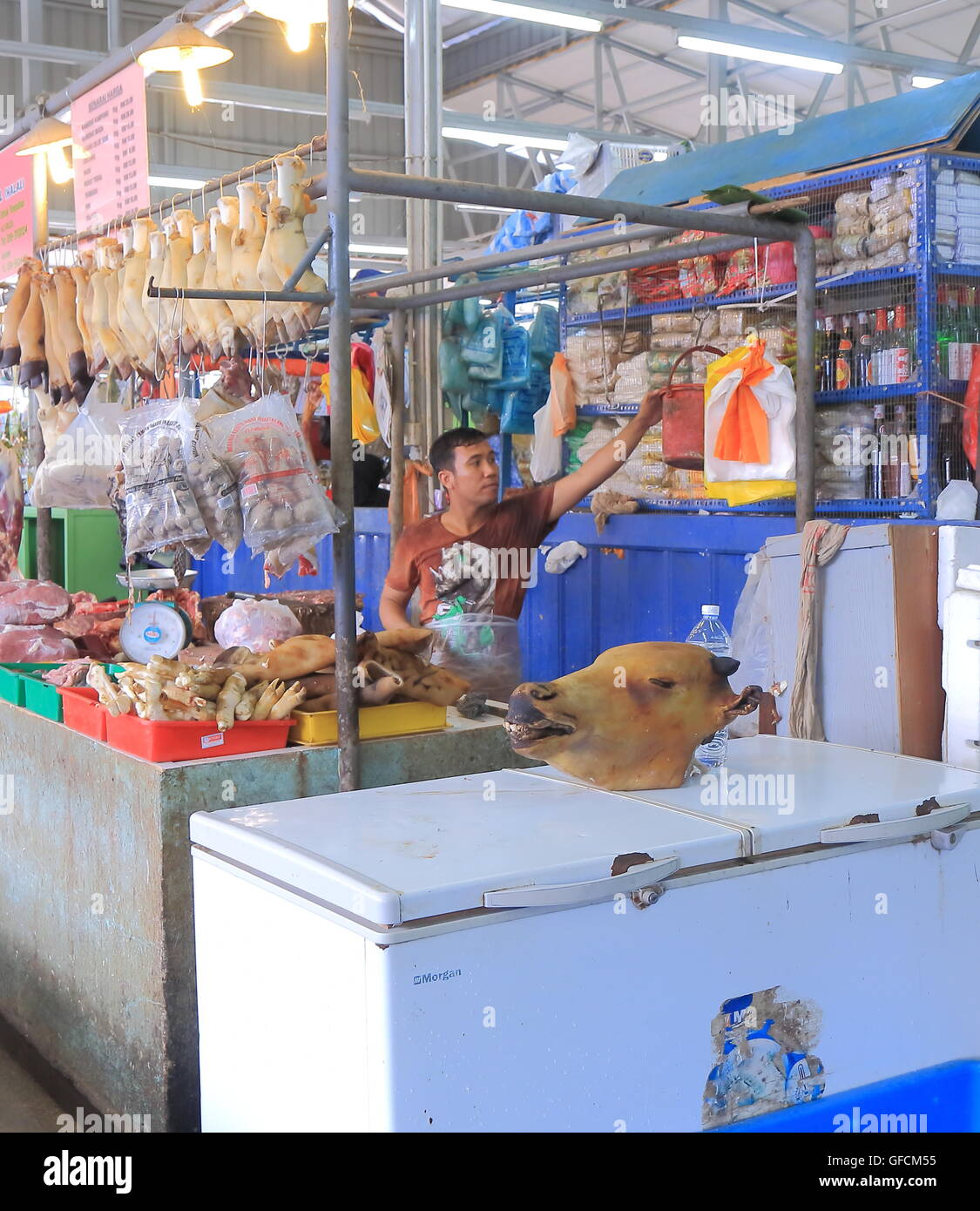 A man works at butcher in Chow Kit in Kuala Lumpur Malaysia Stock Photo ...