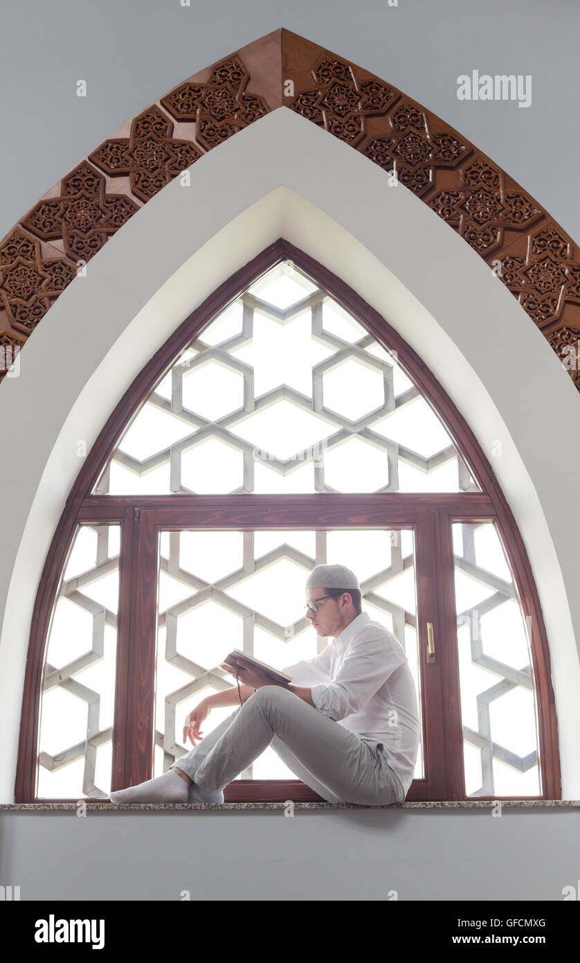 Religious muslim man praying inside the mosque Stock Photo - Alamy
