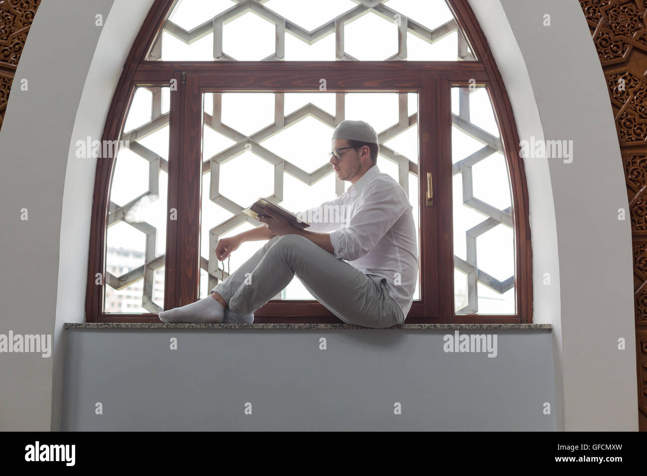 Religious muslim man praying inside the mosque Stock Photo - Alamy