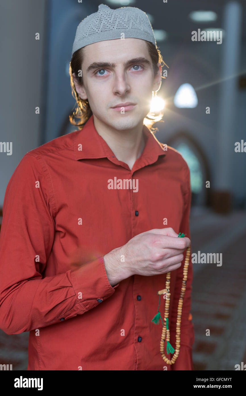 Muslim Man Is Praying In The Mosque Stock Photo - Alamy