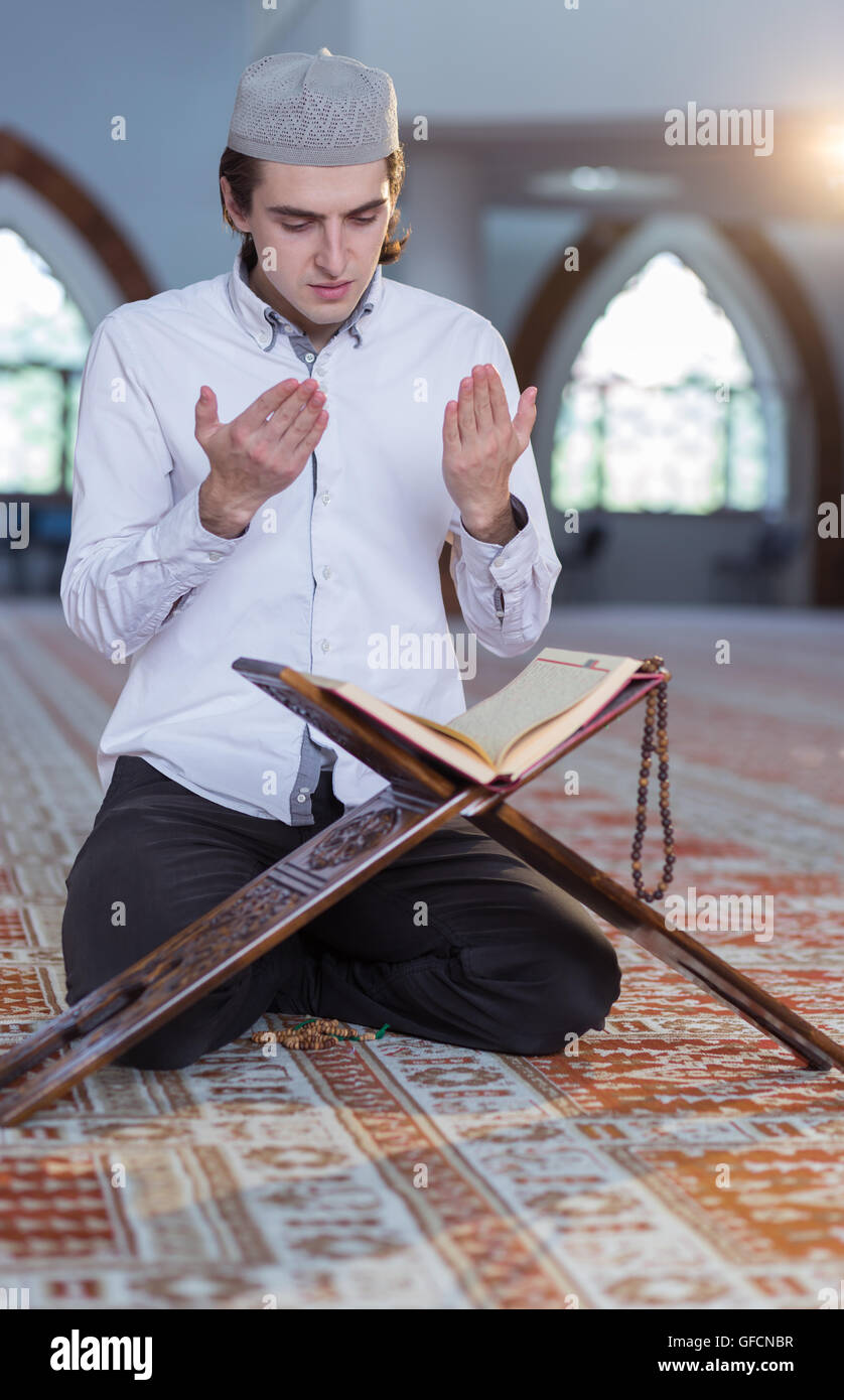 Religious muslim man praying, steps of praying Stock Photo - Alamy