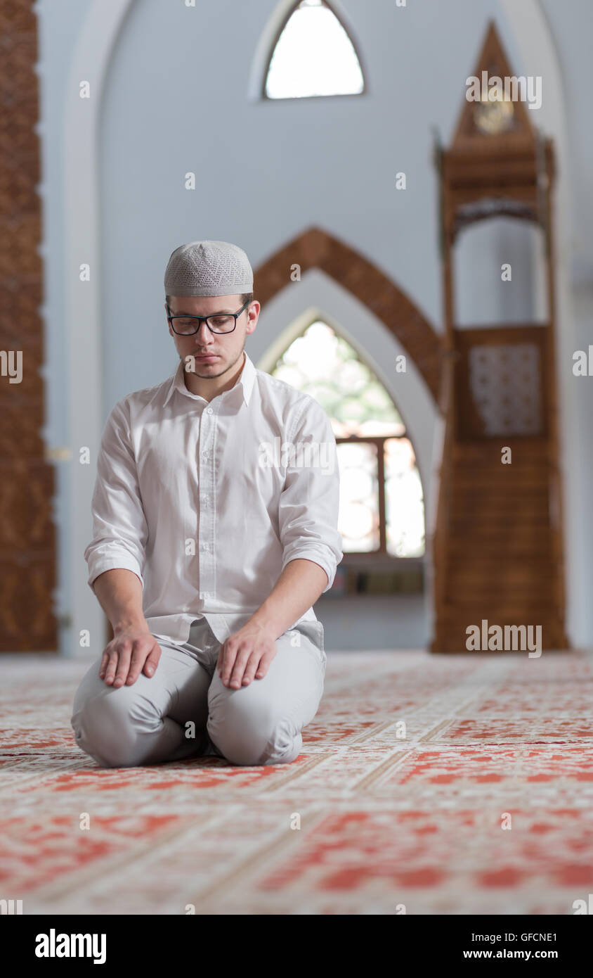 Muslim Man Is Praying In The Mosque Stock Photo - Alamy