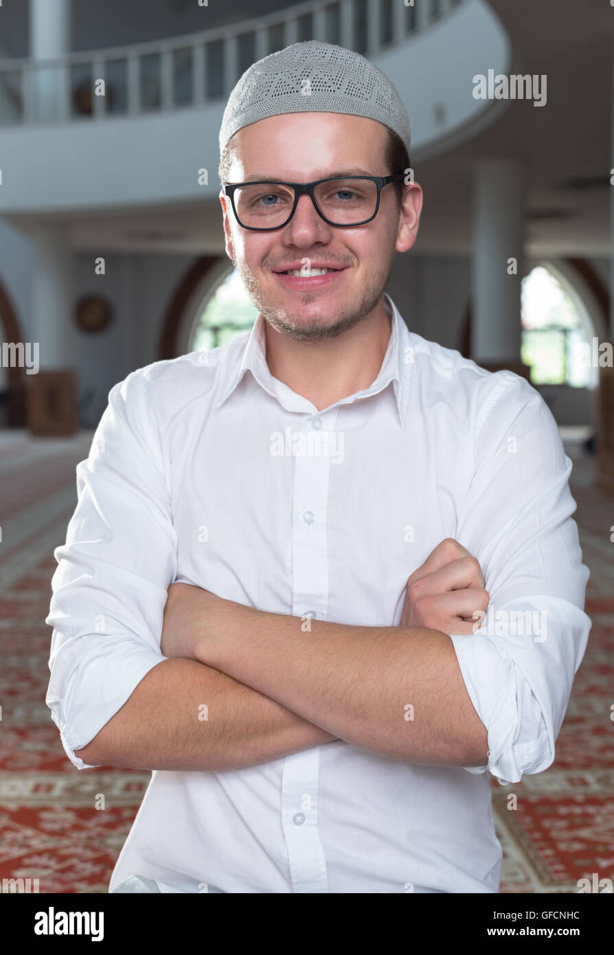 Religious muslim man praying inside the mosque Stock Photo - Alamy