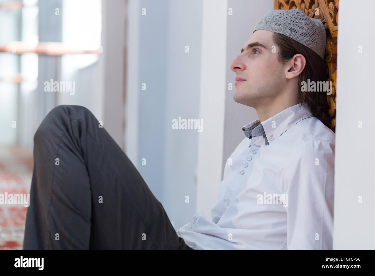 Religious muslim man praying inside the mosque Stock Photo - Alamy