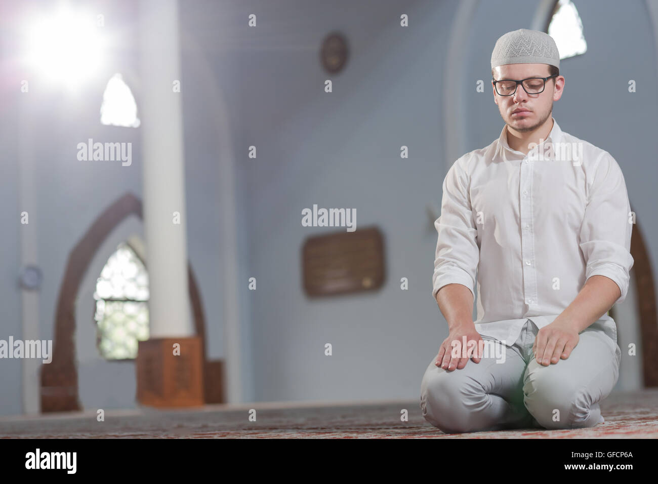 Muslim Man Is Praying In The Mosque Stock Photo - Alamy