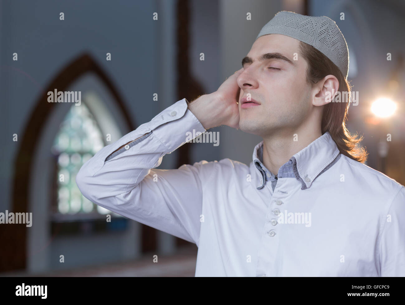 Religious muslim man praying, steps of praying Stock Photo - Alamy