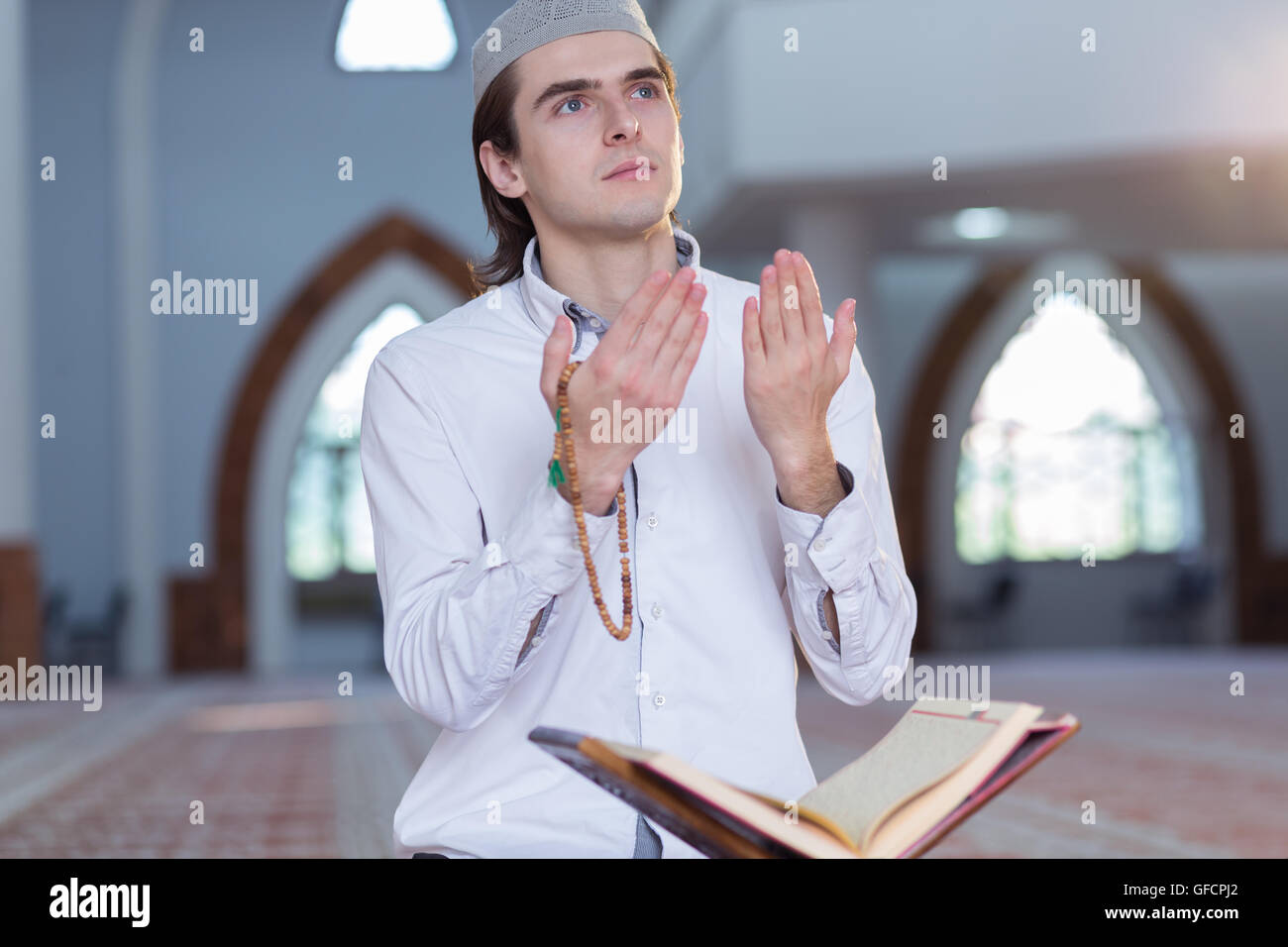 Religious muslim man praying, steps of praying Stock Photo - Alamy