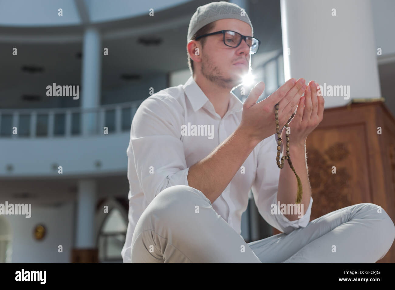 Muslim Man Is Praying In The Mosque Stock Photo - Alamy