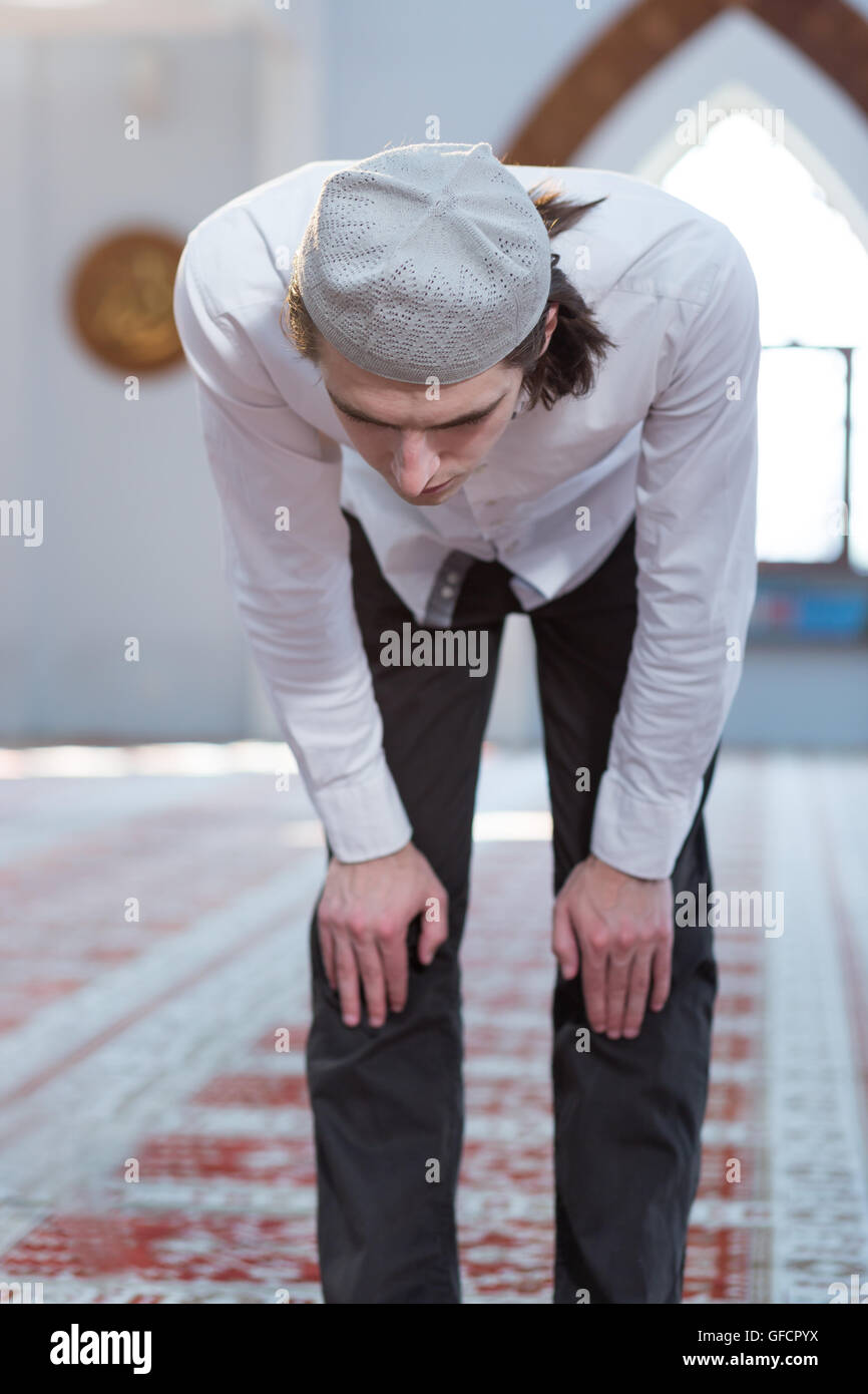 Religious muslim man praying, steps of praying Stock Photo - Alamy