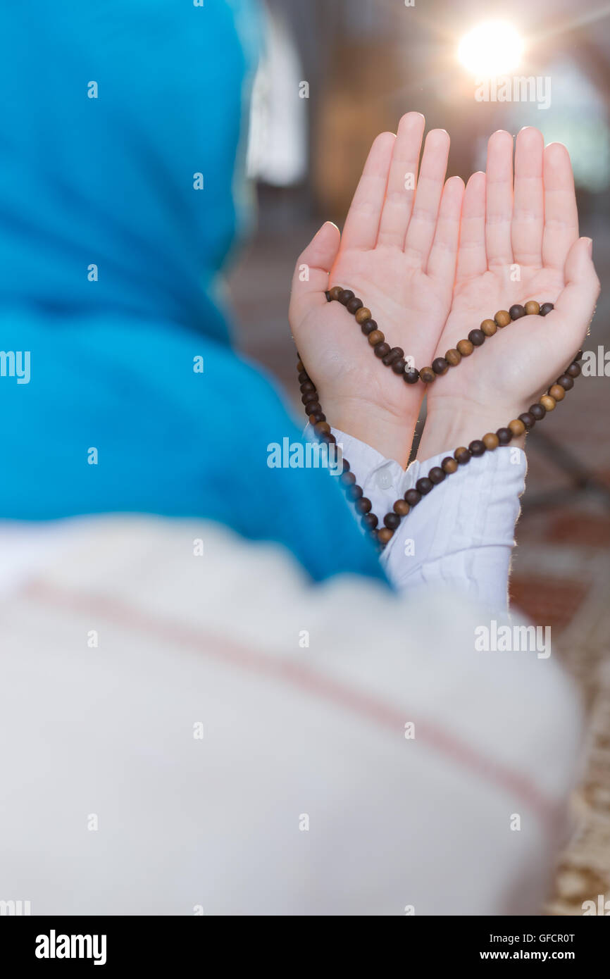 young muslim woman praying for Allah, muslim God Stock Photo - Alamy