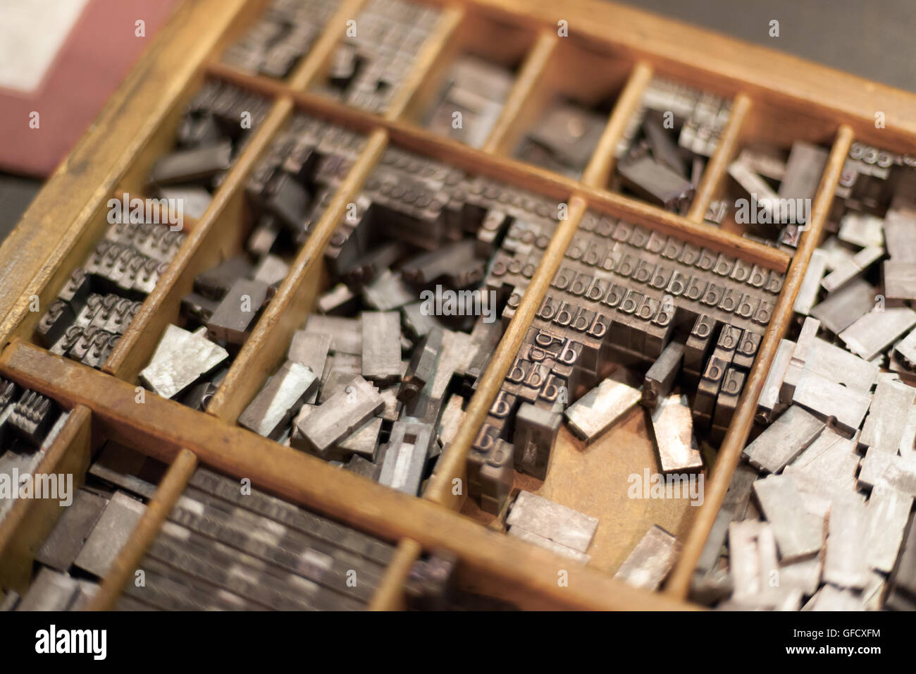 Close-up of metal letterpress letters in printing machinecolor image ...