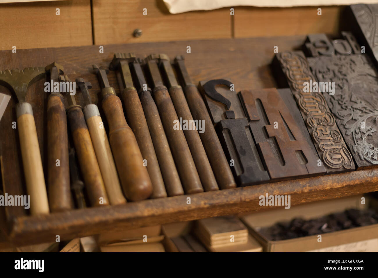 Close-up of printing blocks with work tools in wood boxcolor image ...