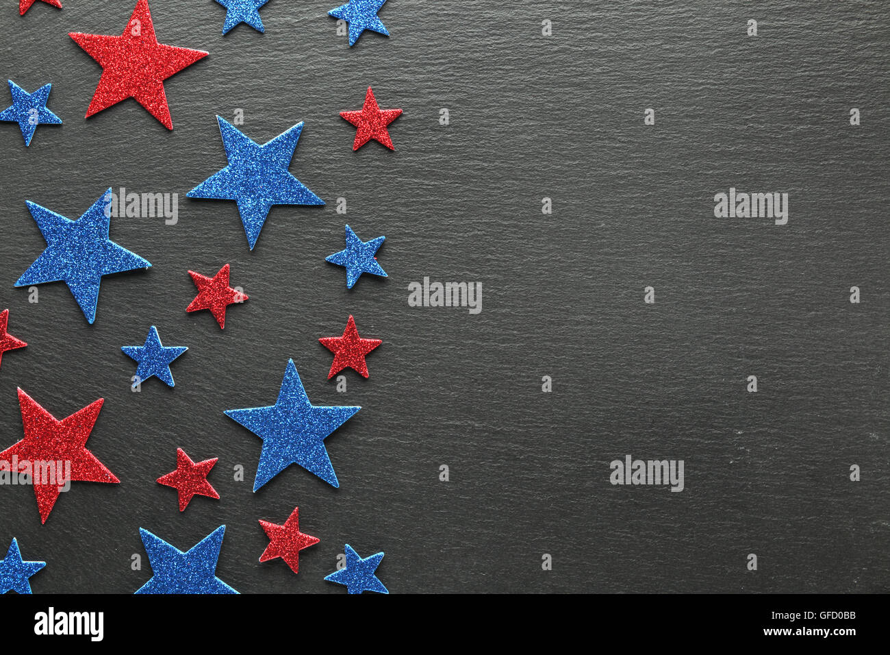 Red and blue stars on slate background Stock Photo - Alamy