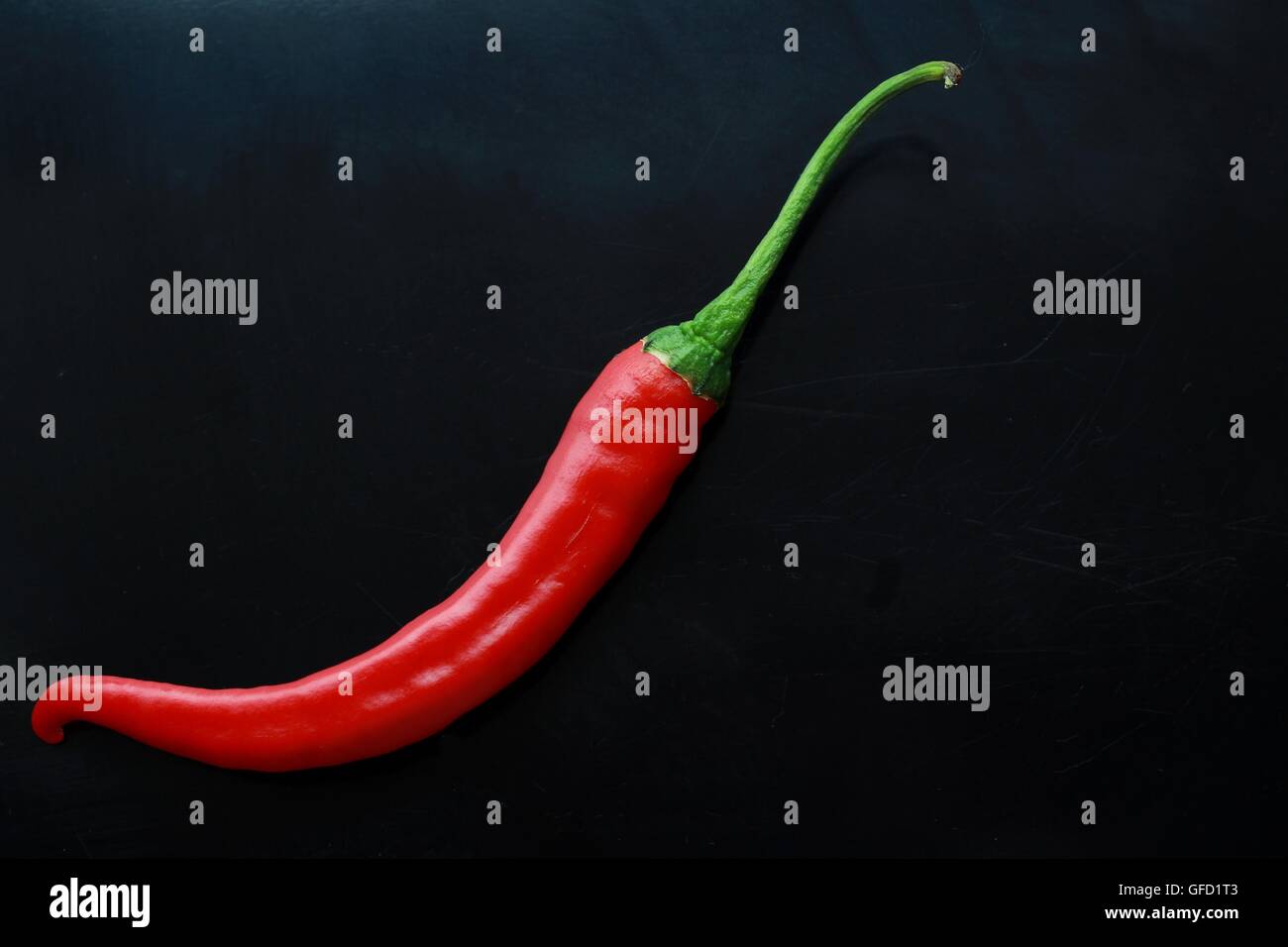 Single red hot chili pepper hi-res stock photography and images - Alamy