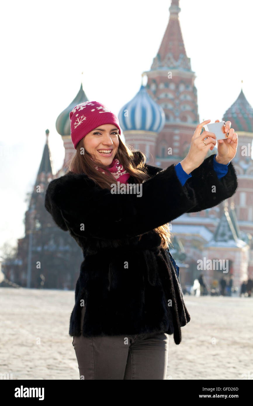Young woman walking on the Red Square in Moscow Stock Photo - Alamy