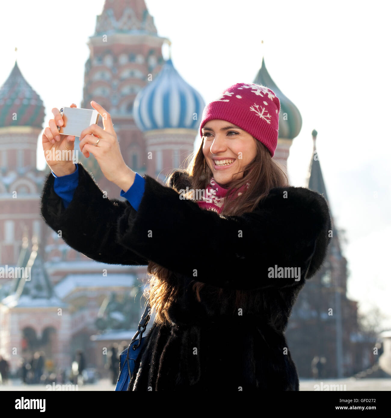 Young woman walking on the Red Square in Moscow Stock Photo - Alamy