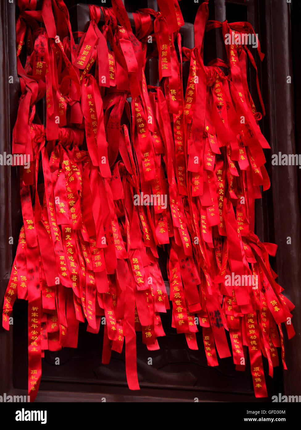 Prayer ribbons tied to a window of the Temple of the Jade Buddha in ...