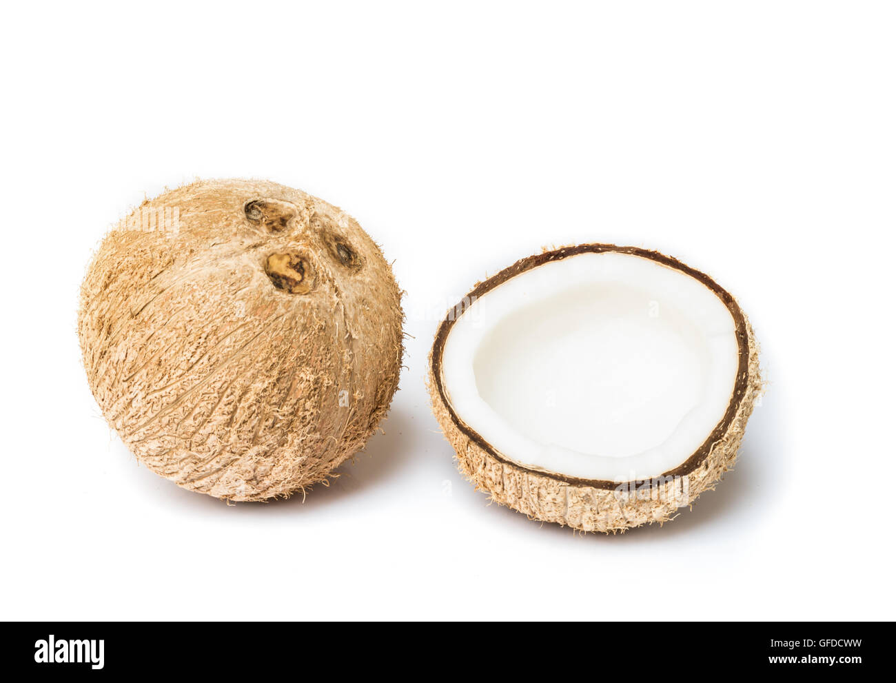 Half of coconut close up on a white background Stock Photo - Alamy