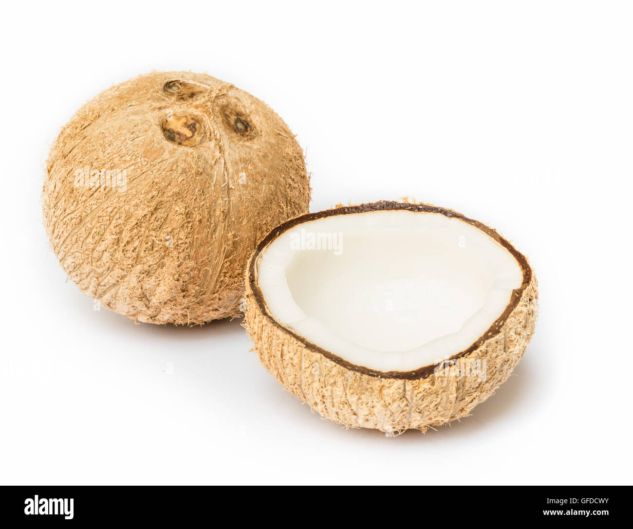 Half of coconut close up on a white background Stock Photo - Alamy
