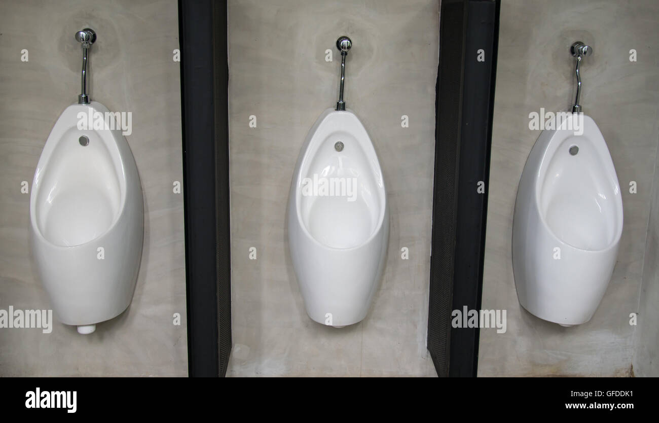 row of chamber pot in men public toilet Stock Photo - Alamy