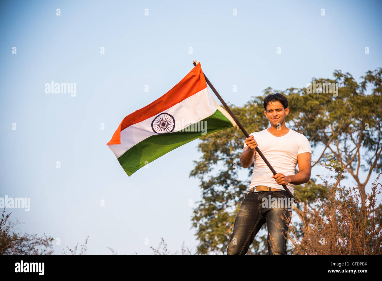 Indian man holding flag High Resolution Stock Photography and Images ...